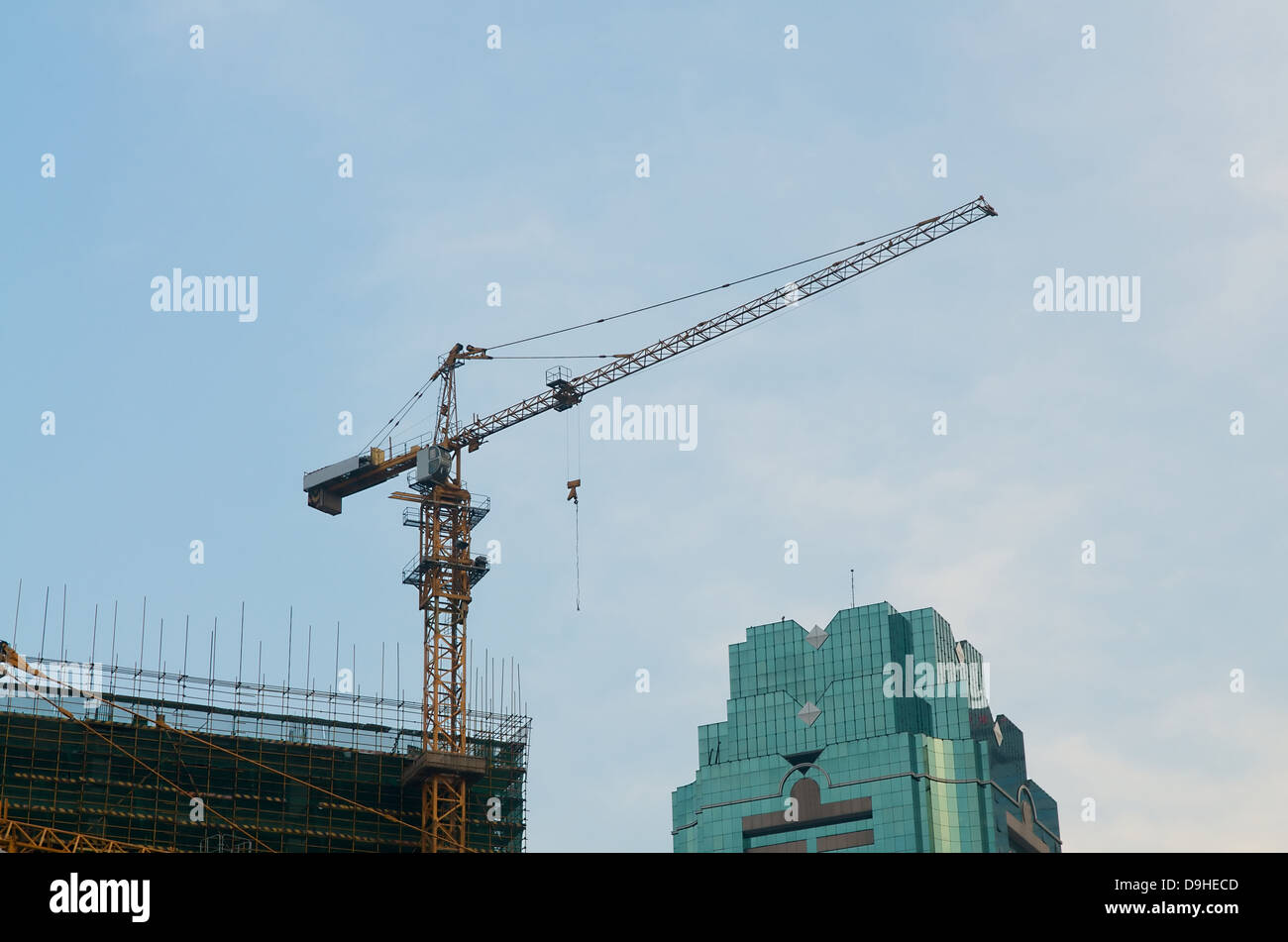 Building in Construction with crane Stock Photo - Alamy