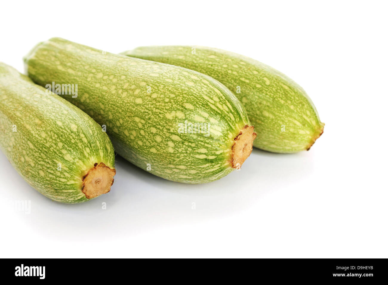 Fresh zucchini isolated on white background Stock Photo - Alamy
