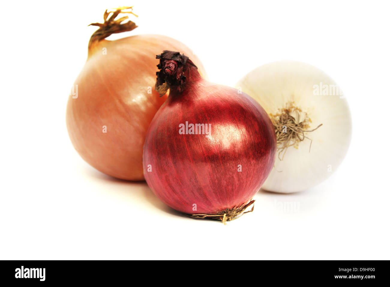 Three onions white background hi-res stock photography and images - Alamy