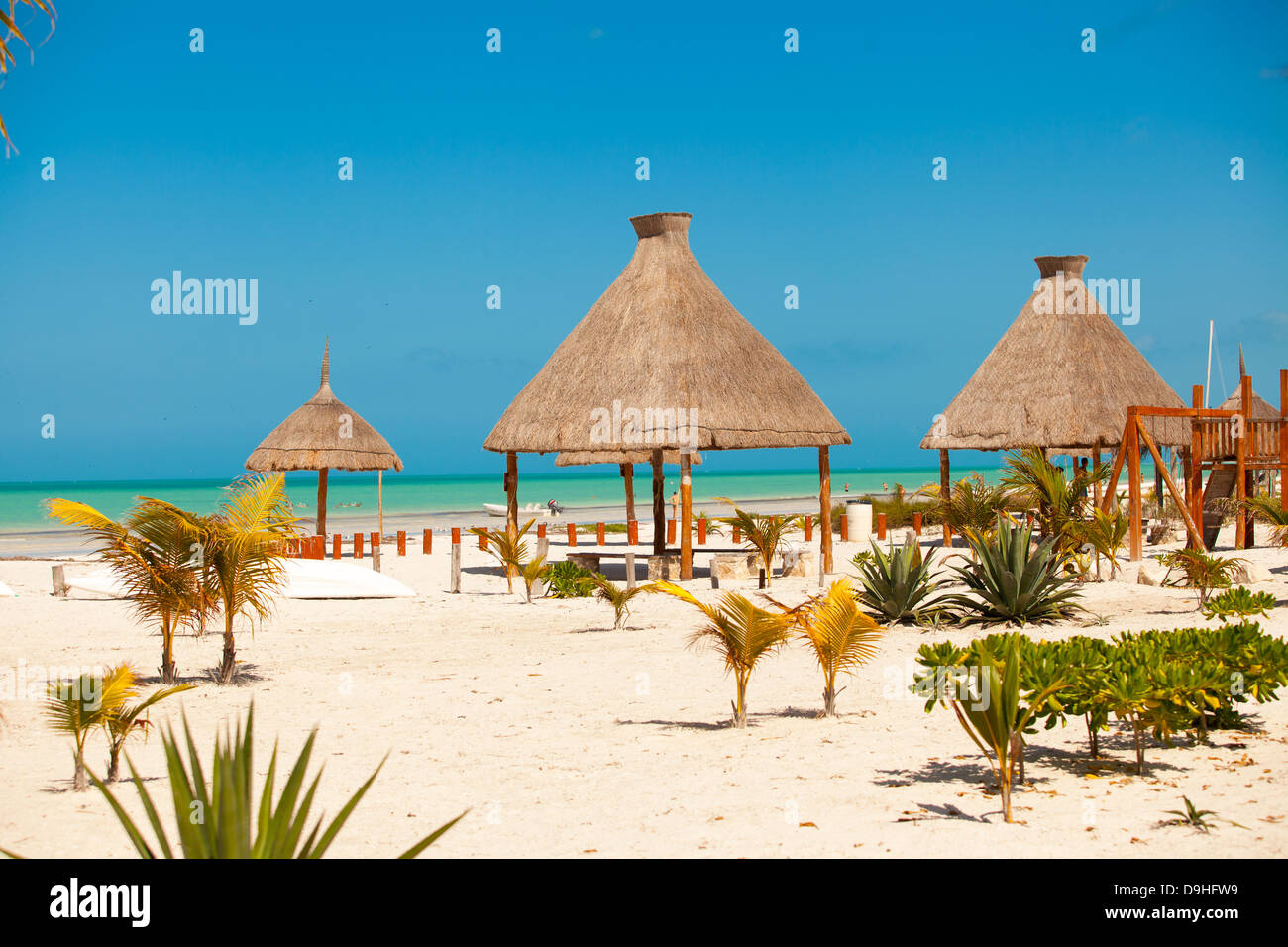 Luxury hotel at tropical resort on ocean shore with palm trees Stock ...
