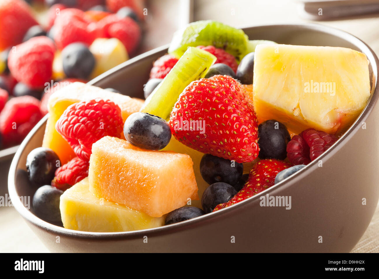 Fresh Organic Fruit Salad on a plate Stock Photo - Alamy