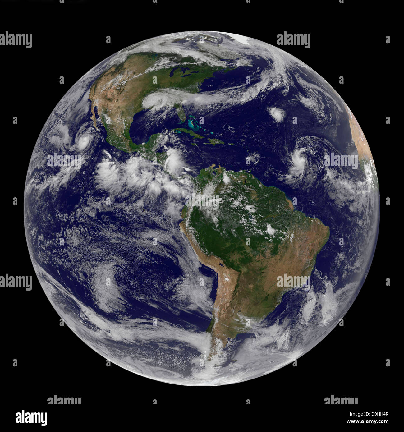Satellite image of Earth and three tropical cyclones Stock Photo - Alamy