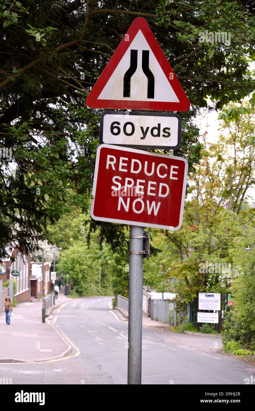 Reduce speed sign hi-res stock photography and images - Alamy