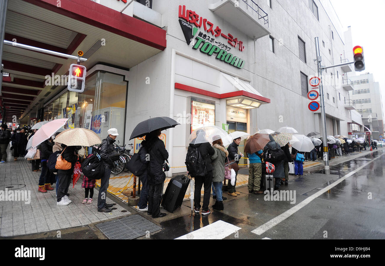 People wait for buses at an intercity bus station in Yamagata city of ...