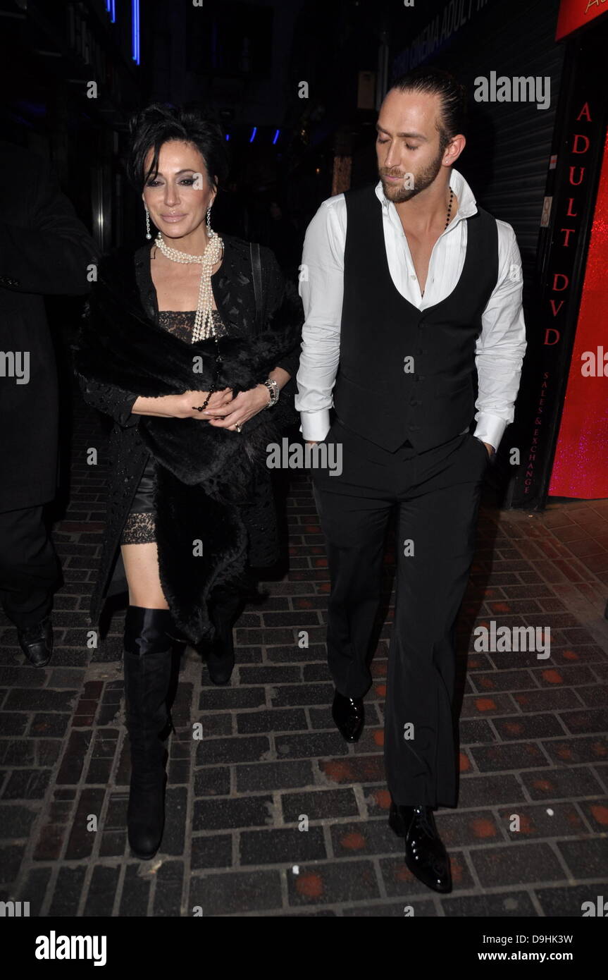 Nancy Dell'Olio and a younger man outside Box Nightclub and Cabaret in ...