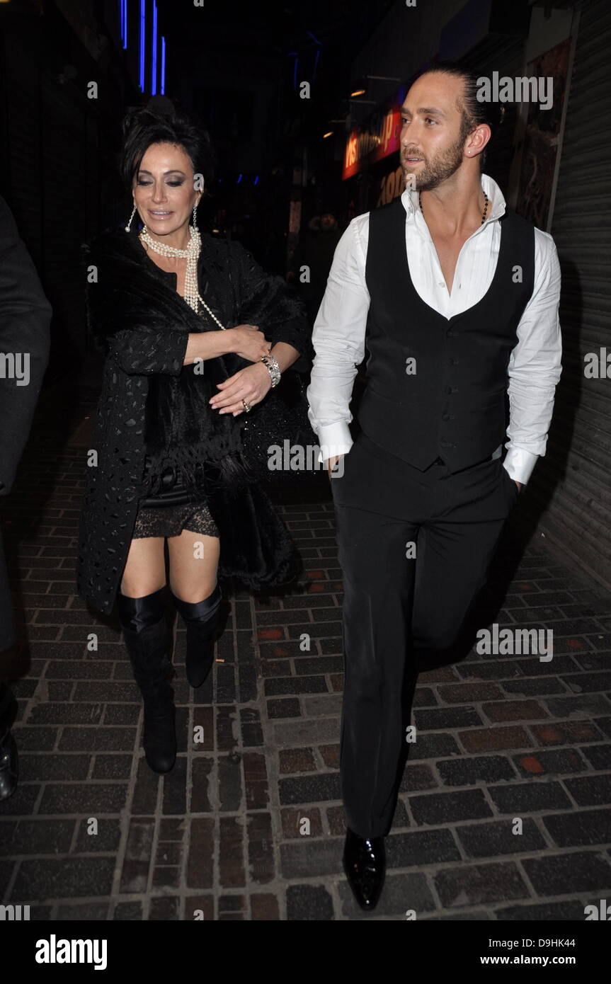 Nancy Dell'Olio and a younger man outside Box Nightclub and Cabaret in ...