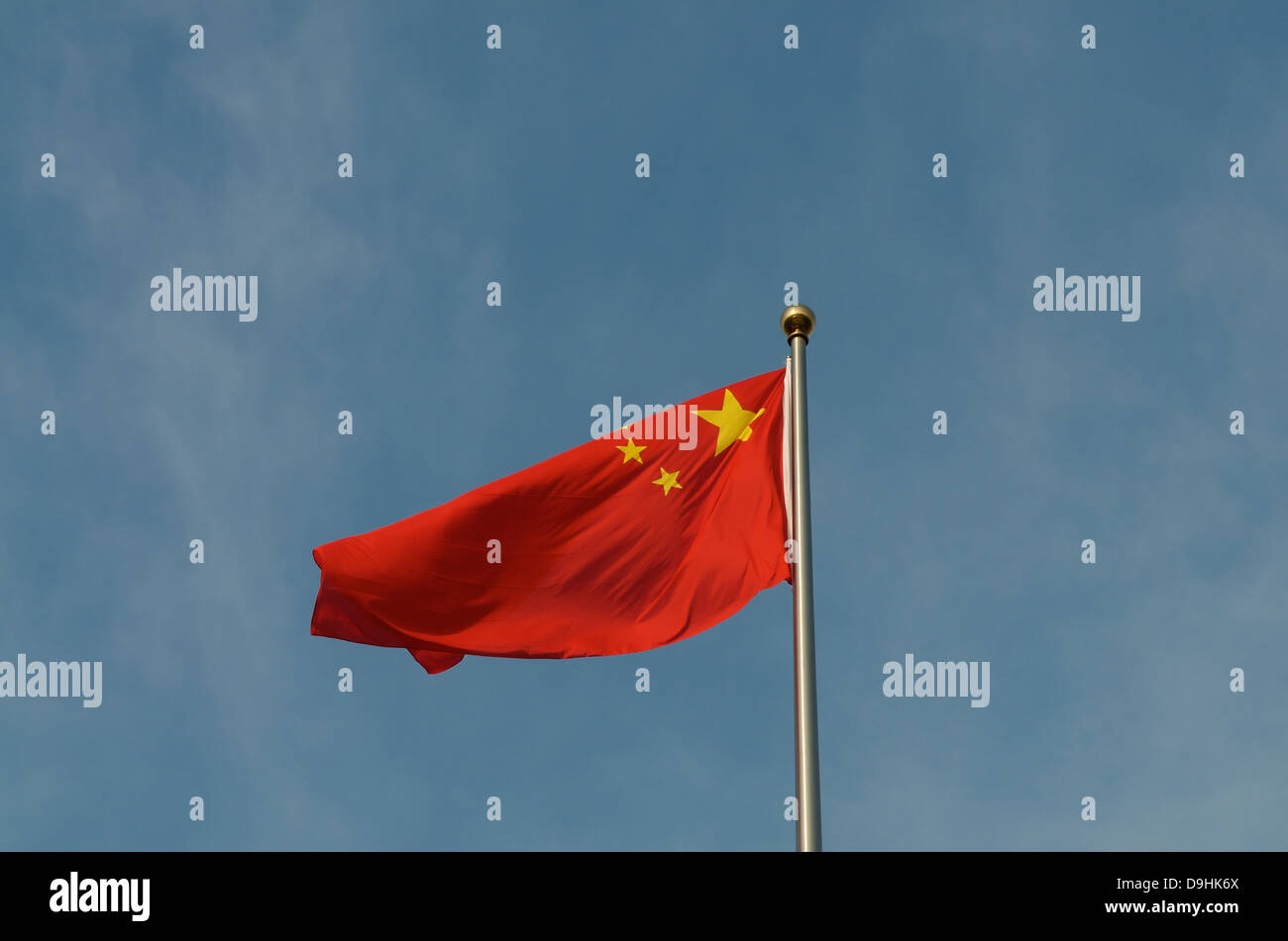 Chinese Flag under blue sky Stock Photo - Alamy