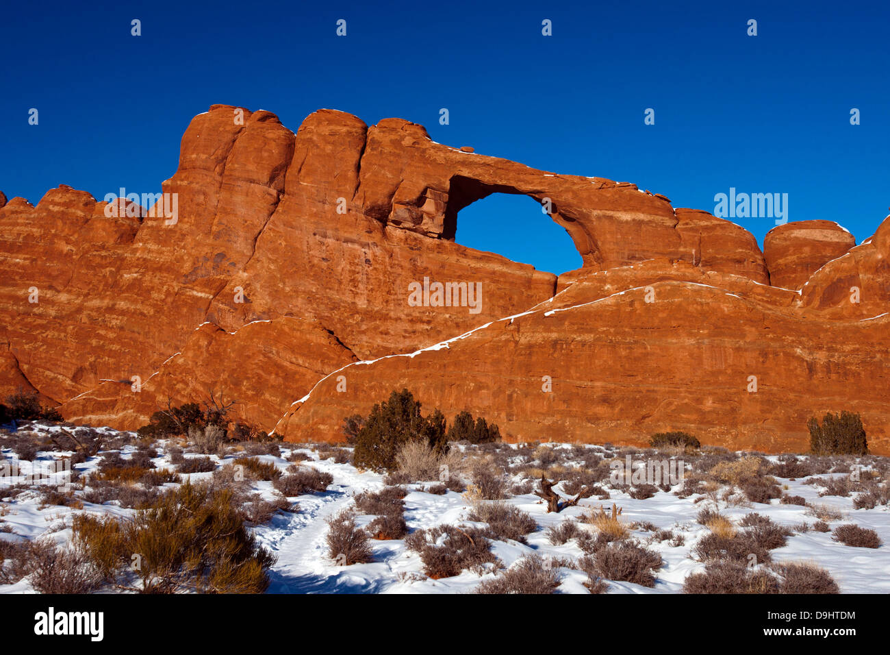 Skyline Arch on a winter afternoon with snow on the ground, Arches ...