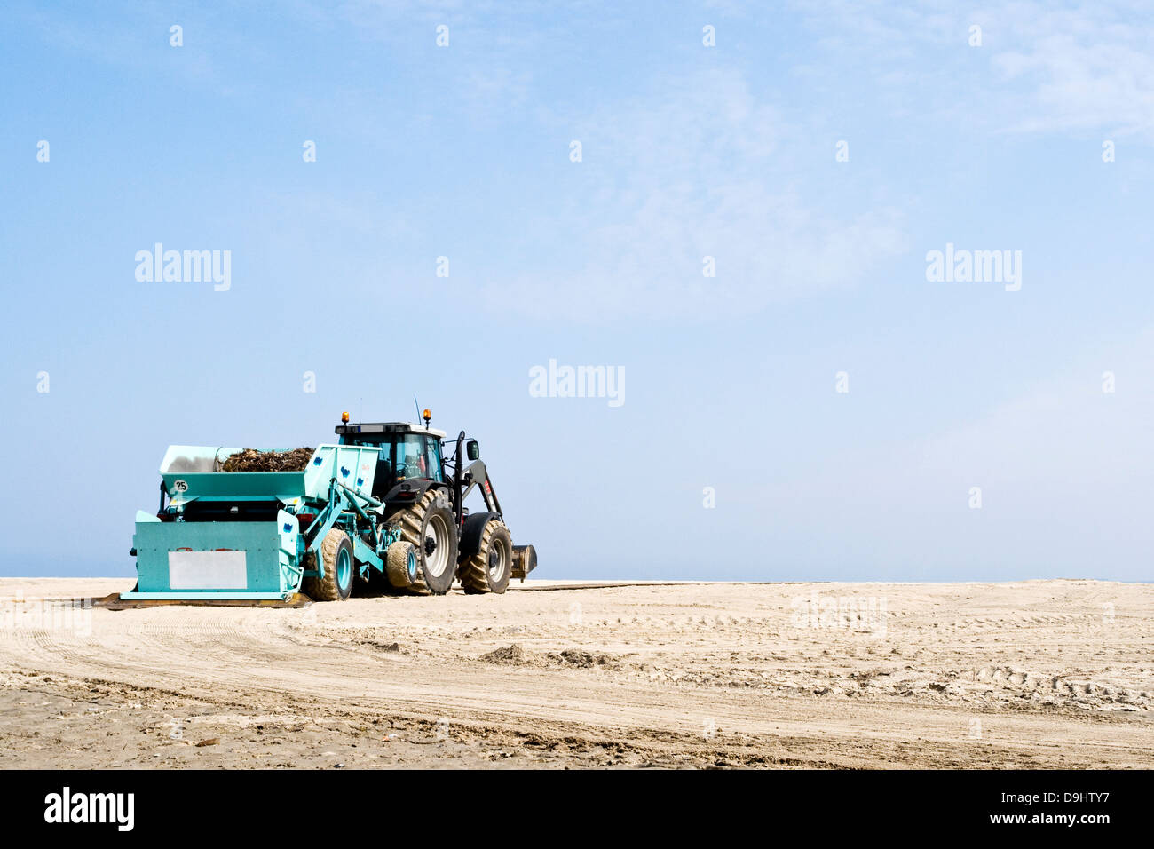 Tractor on the beach Stock Photo - Alamy