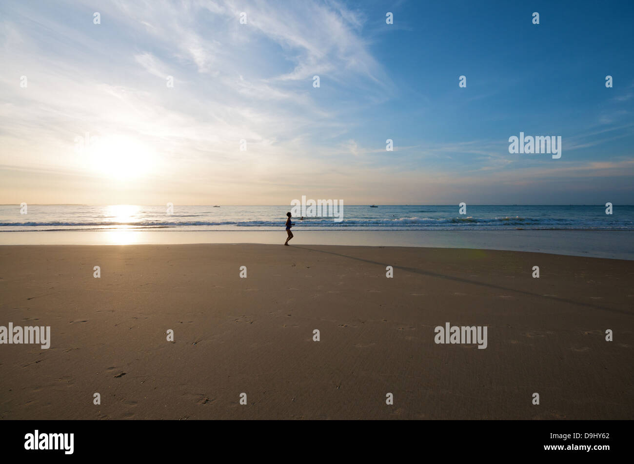 Running on a beautiful beach Stock Photo - Alamy