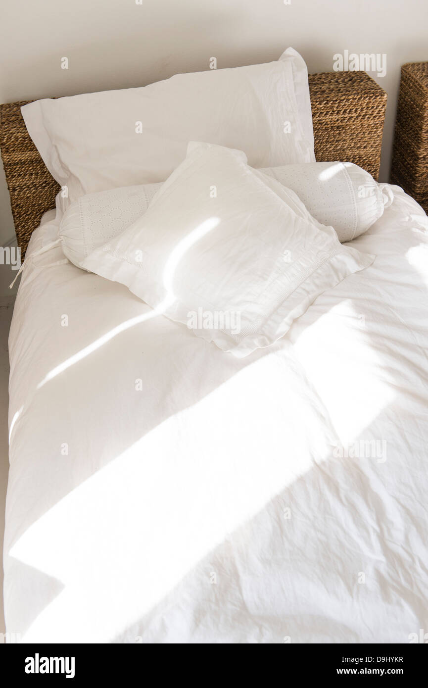 Sunlight falling on a bed Stock Photo - Alamy