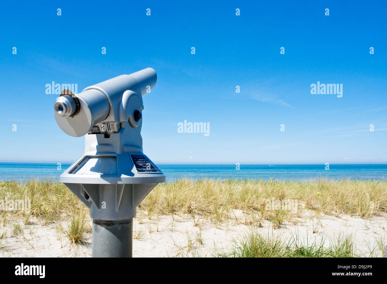 Telescope on the beach Stock Photo - Alamy