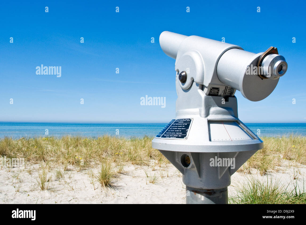 Telescope on the beach Stock Photo - Alamy
