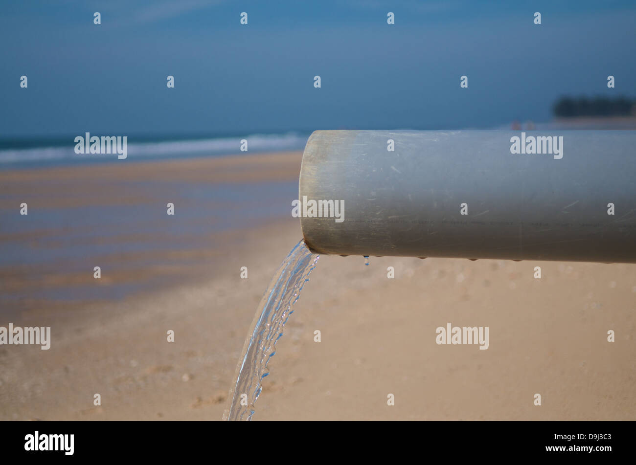 Clean Water pipe at a beach Stock Photo - Alamy