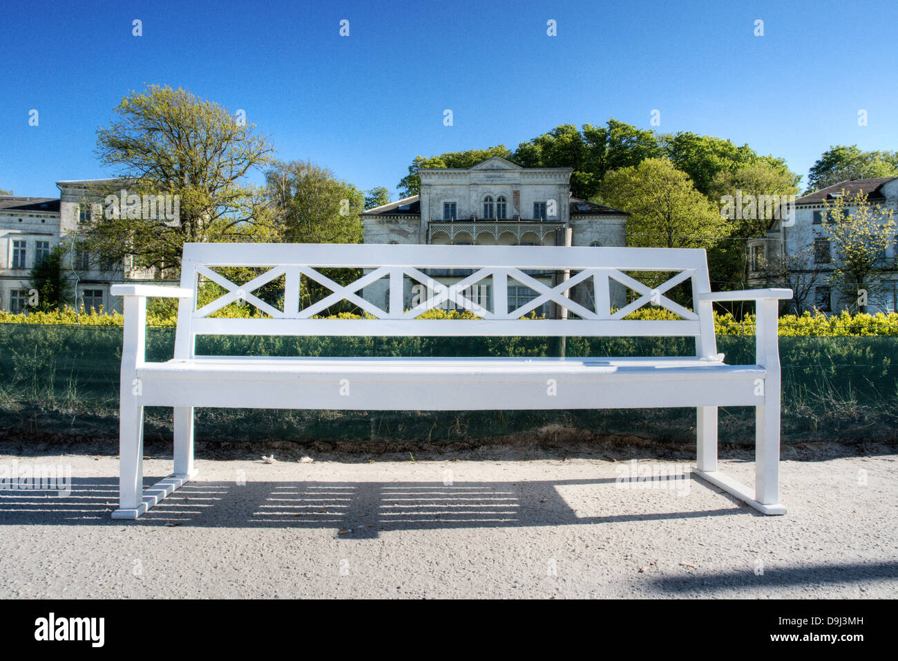 Bench before ailing villas in the seafront in saint's dam Stock Photo ...