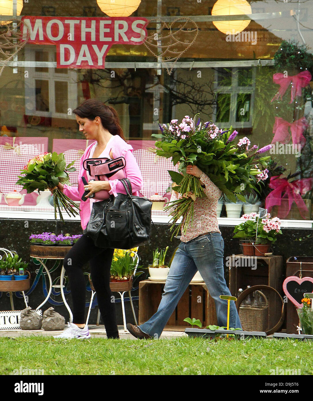 Sheree Murphy leaves a florist with a bunch of flowers ahead of Mother ...