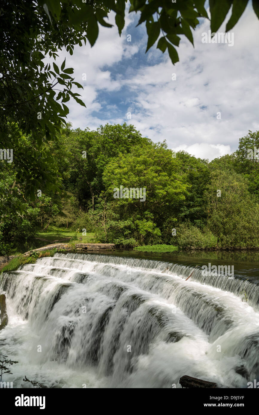 Monsal dale Weir and the River Wye flowing through the Derbyshire ...