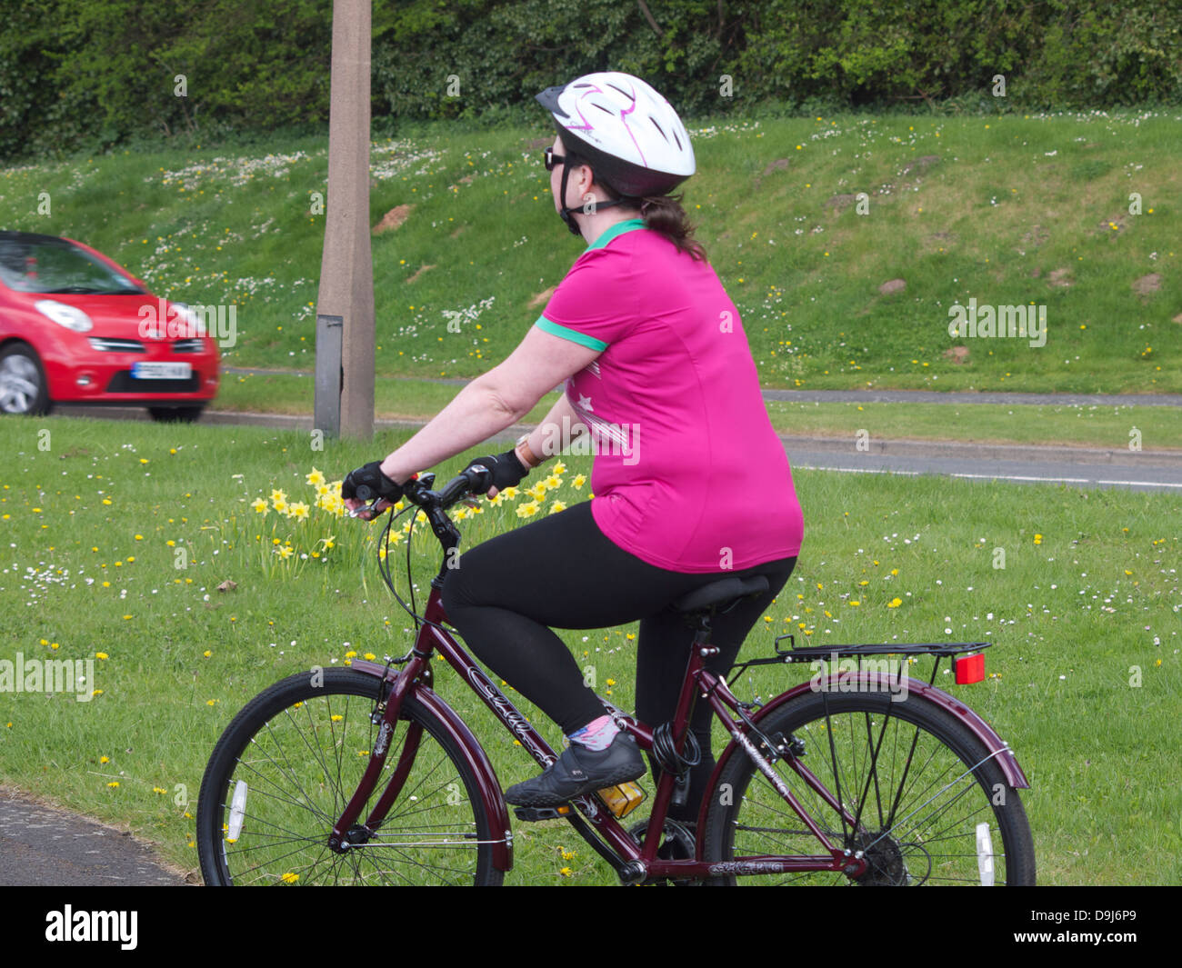 Lady on bicycle hi-res stock photography and images - Alamy