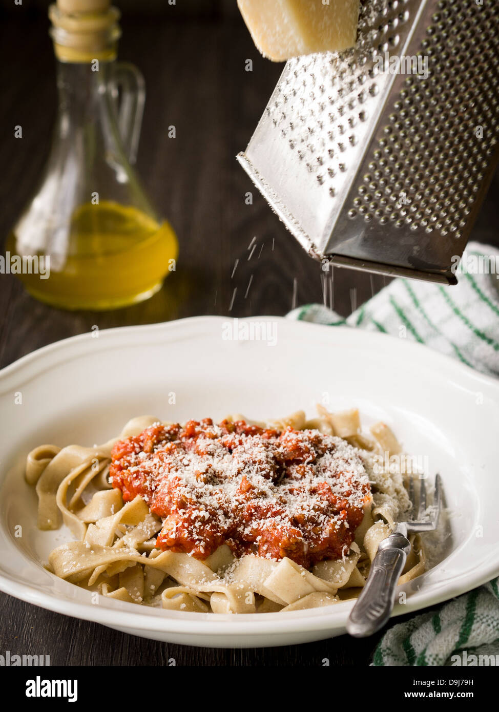 Homemade rye pasta with bolognese sauce and parmesan cheese Stock Photo ...