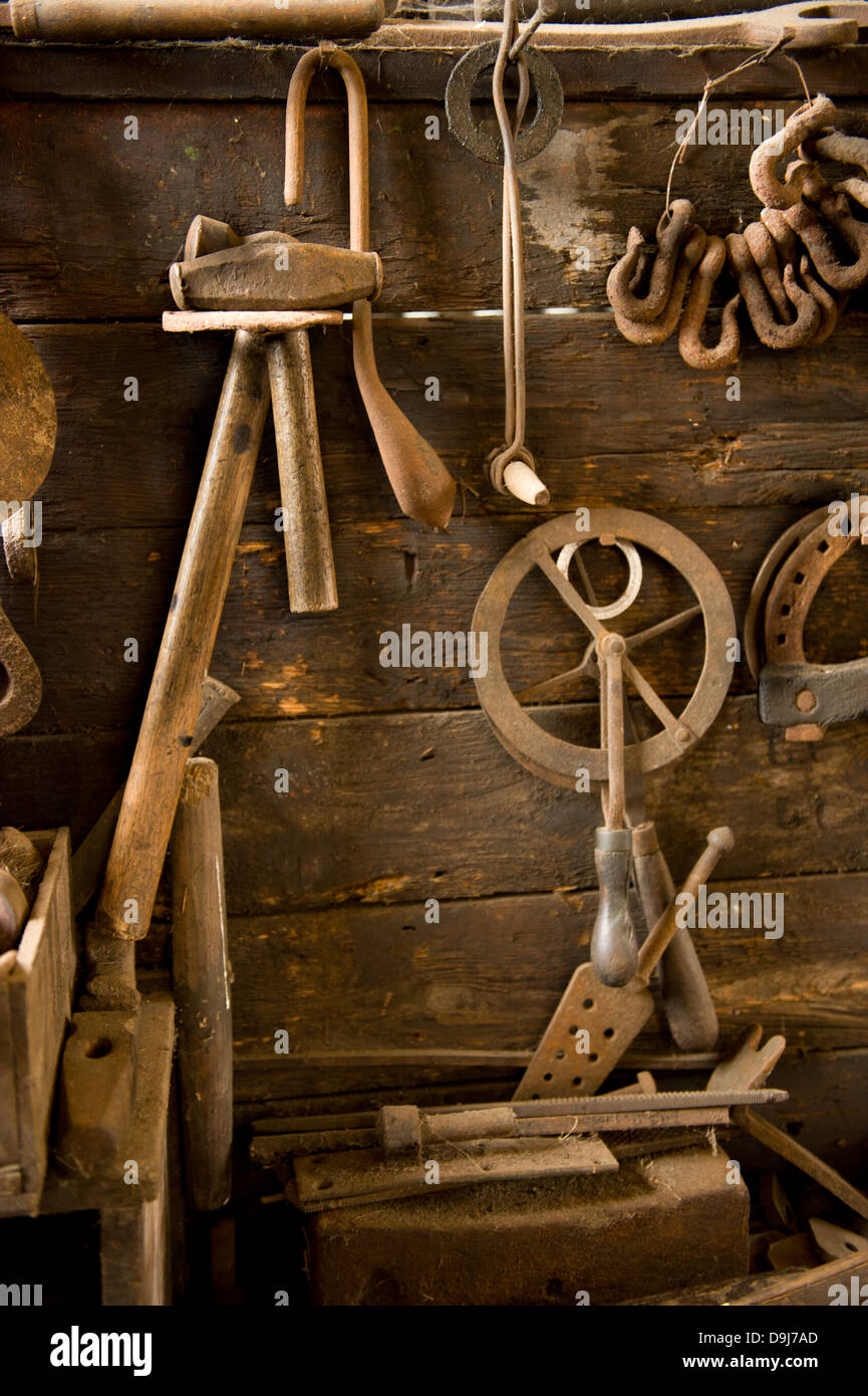 Tools hanging on a wall Stock Photo - Alamy