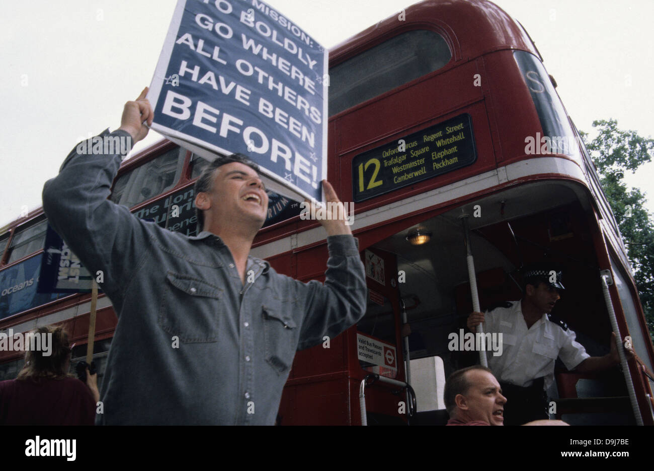 Disabled protesters from Direct Action Network (DAN) hold up buses in ...