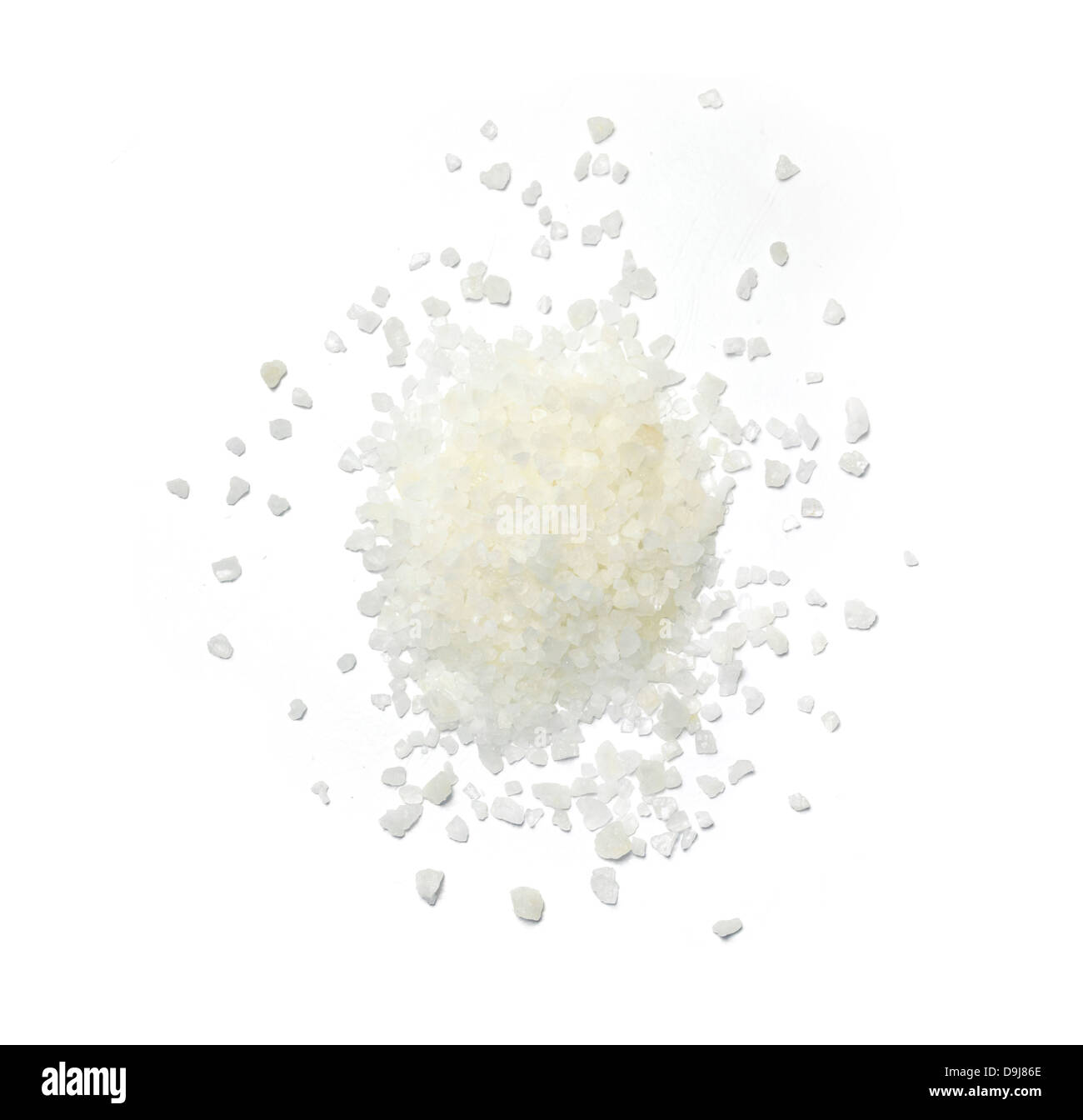 pile of loose white salt flakes makeup cut out onto a white background ...