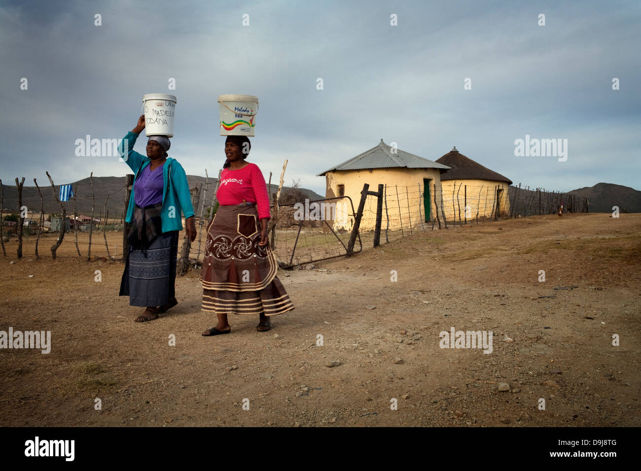 Two women collect water in rural Transkei, South Africa Stock Photo - Alamy