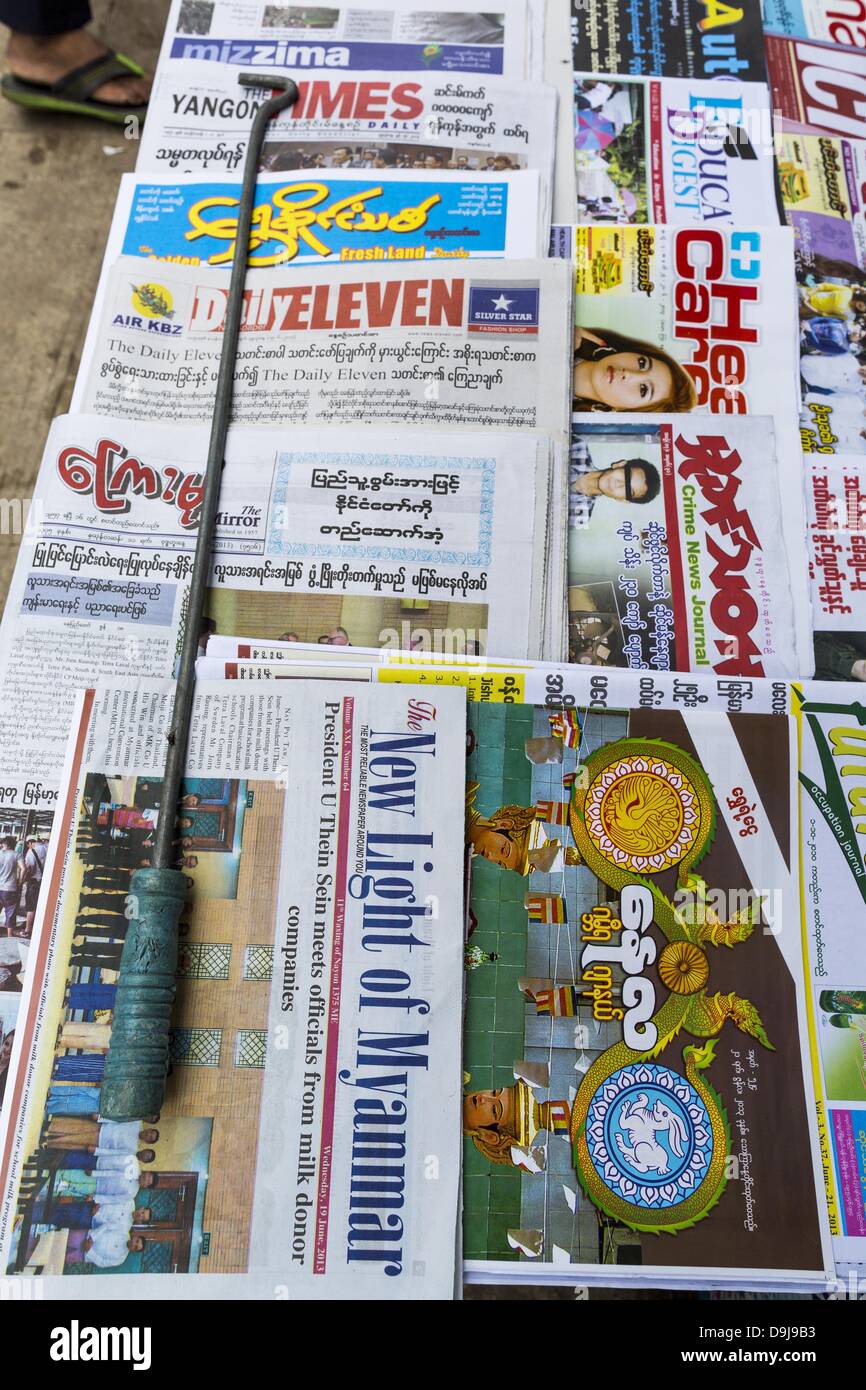 June 19, 2013 - Yangon, Union of Myanmar - Newspapers for sale at a ...
