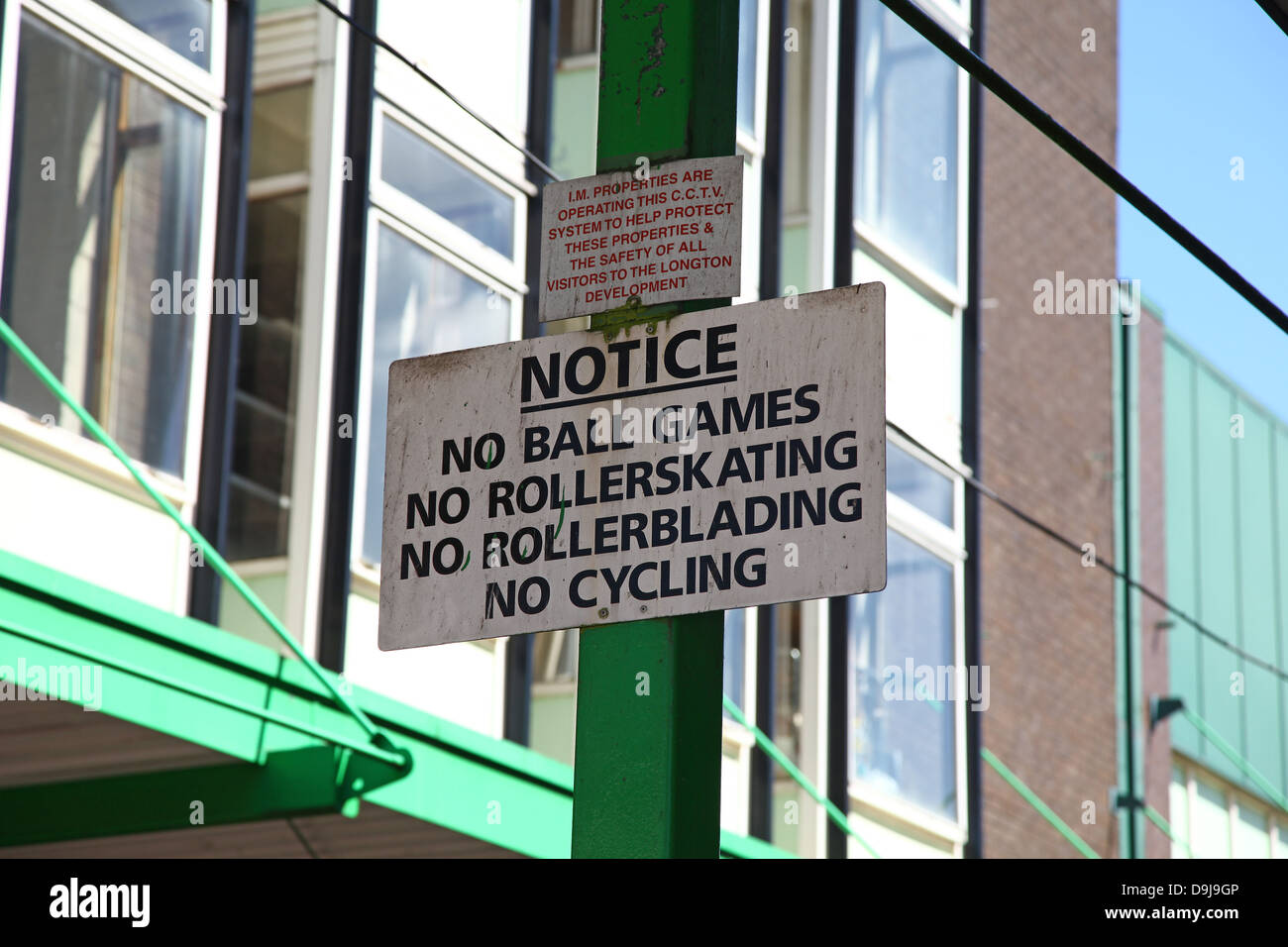 A sign or notice no ball games no rollerskating no rollerblading no ...