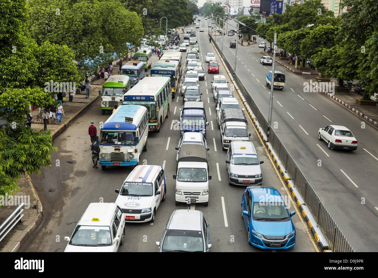 June 19, 2013 - Yangon, Union of Myanmar - Buses line up at one of the ...