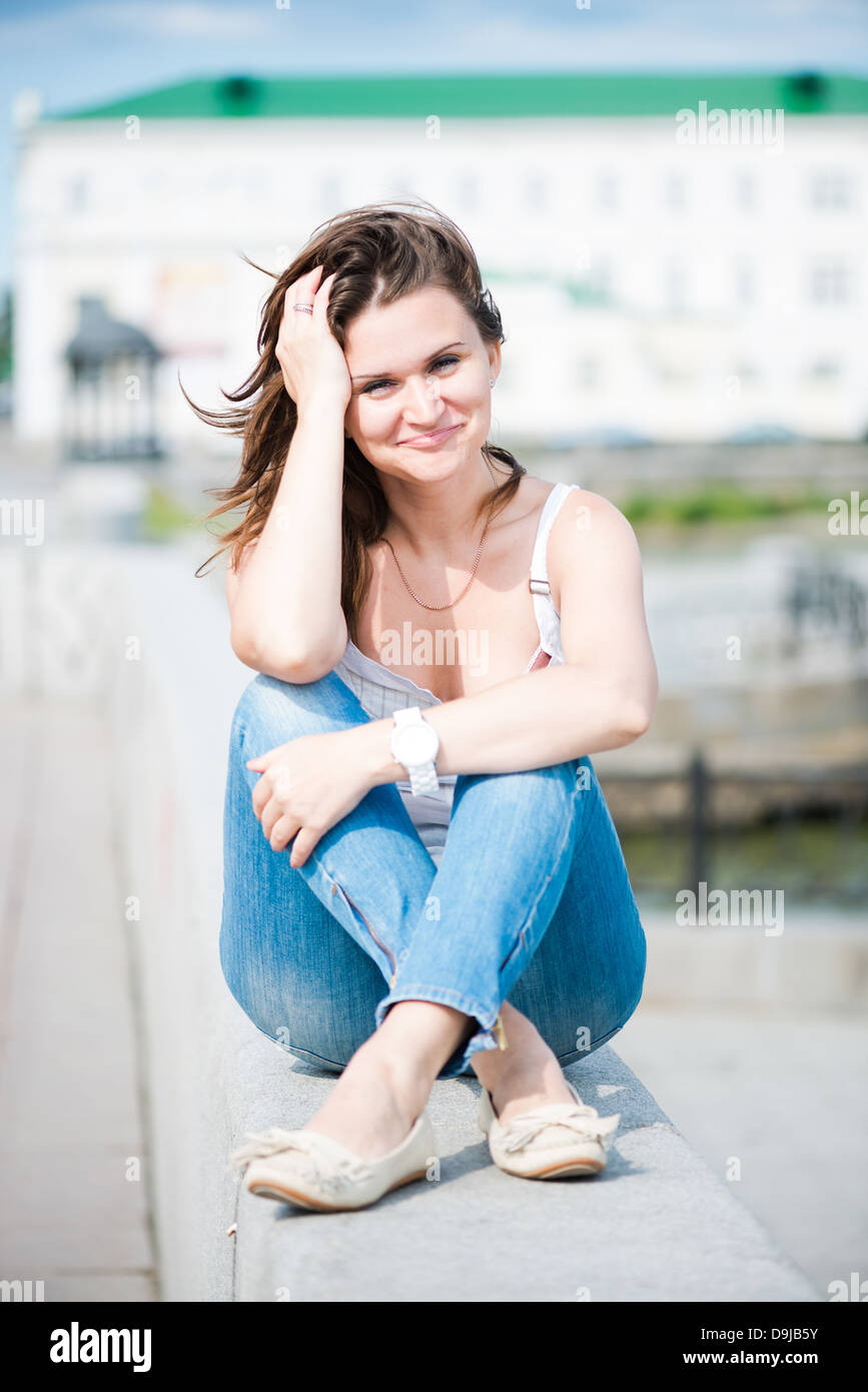 Portrait of a beautiful european woman smiling outdoors Stock Photo - Alamy