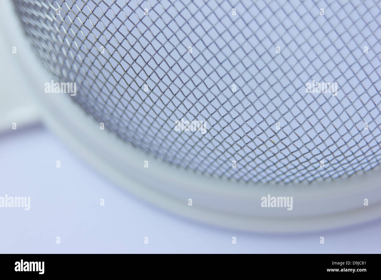 Detail of a withe stainer, kitchen instruments Stock Photo - Alamy