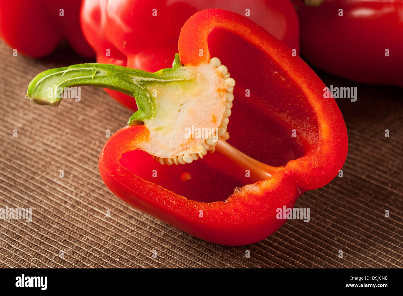 Fresh Organic Red Bell Pepper against a background Stock Photo - Alamy