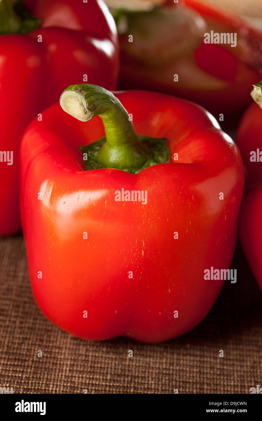Fresh Organic Red Bell Pepper against a background Stock Photo - Alamy