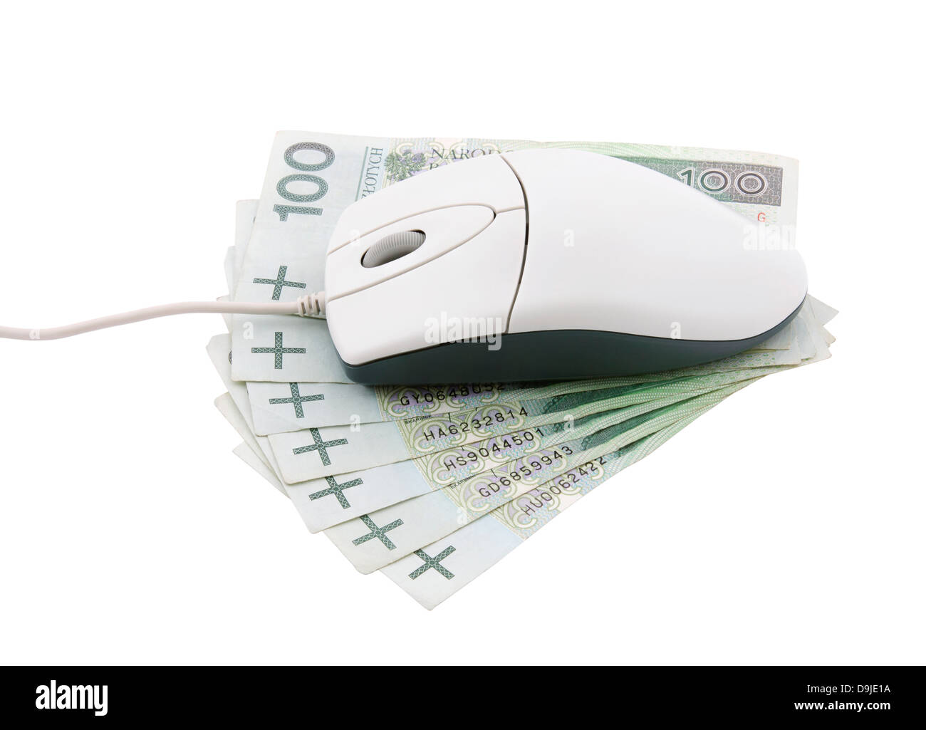 Computer mouse on polish money with clipping path Stock Photo - Alamy