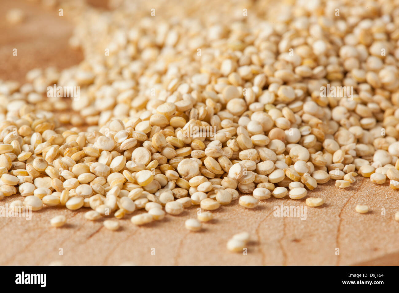 Raw Organic Quinoa Seeds against a background Stock Photo - Alamy