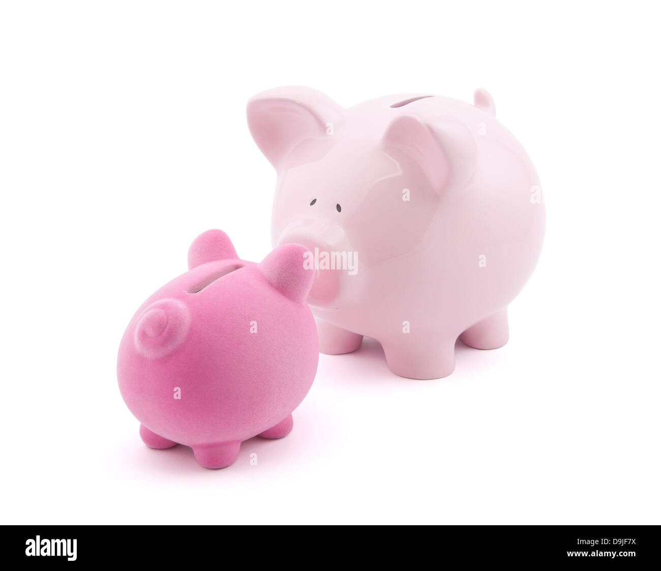 Two piggy banks with clipping path Stock Photo - Alamy