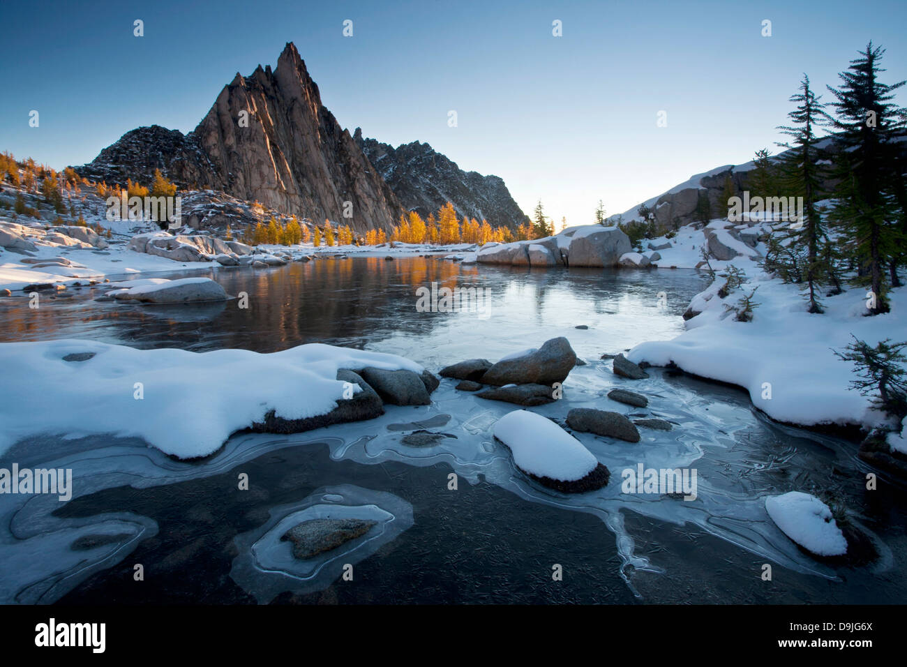 Prusik Peak above frozen Gnome Tarn after an early snow storm ...