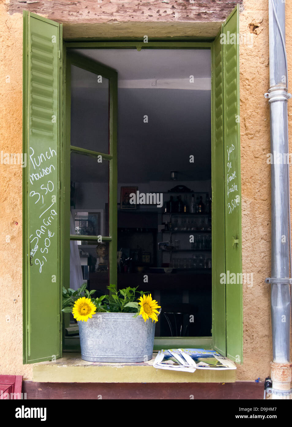 Cafe window with sunflowers, Perigueux, France Stock Photo - Alamy