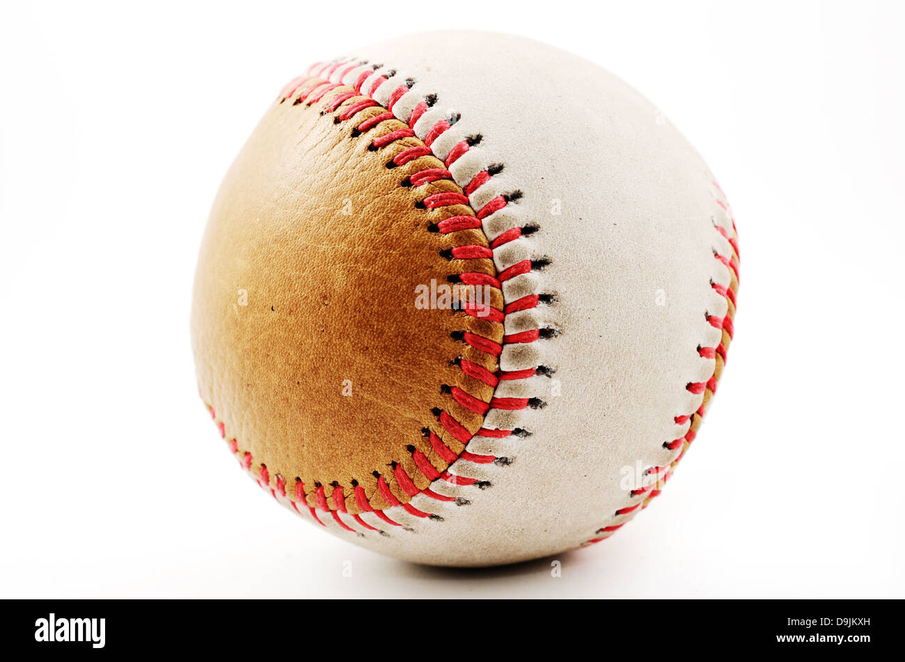 dirty baseball, white and brown on a light background, close-up Stock ...