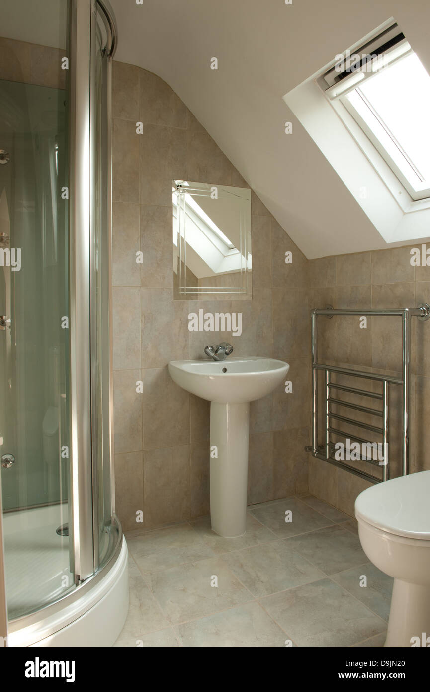 Fully tiled shower room interior Stock Photo - Alamy