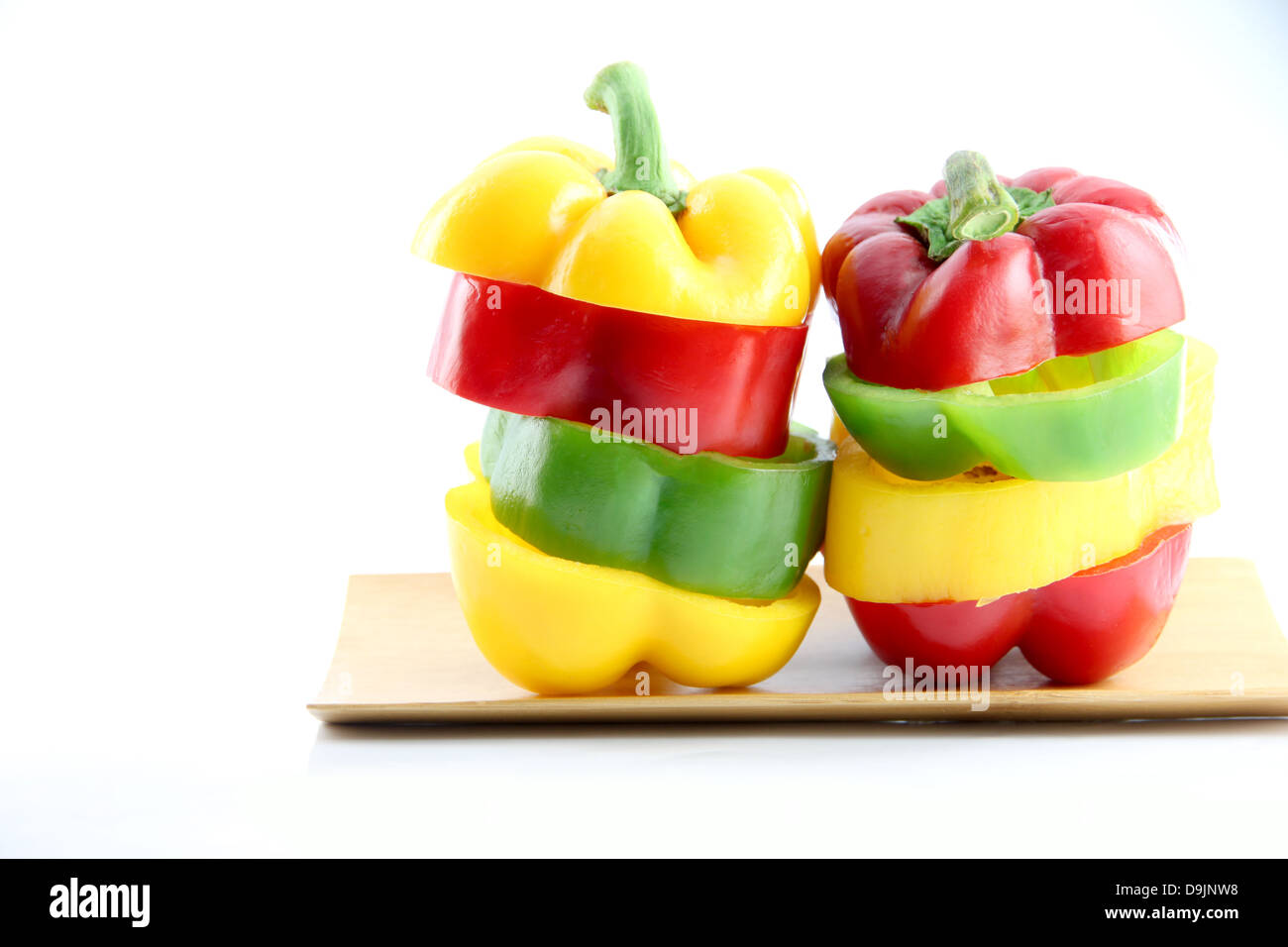 Slice the Three color of bell pepper in Arranged vertically on Bamboo ...