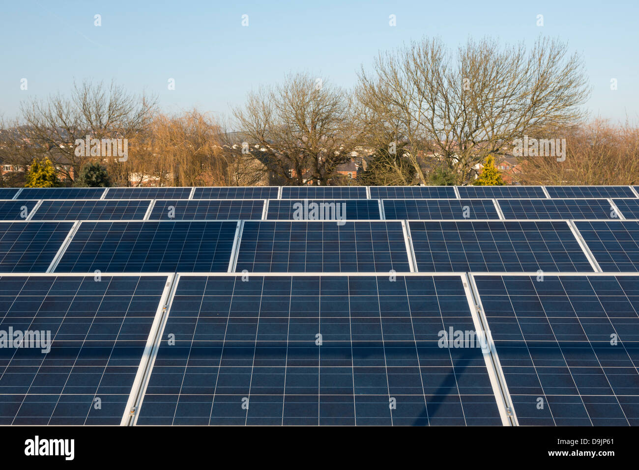 Photovoltaic solar panels on a factory roof Stock Photo - Alamy