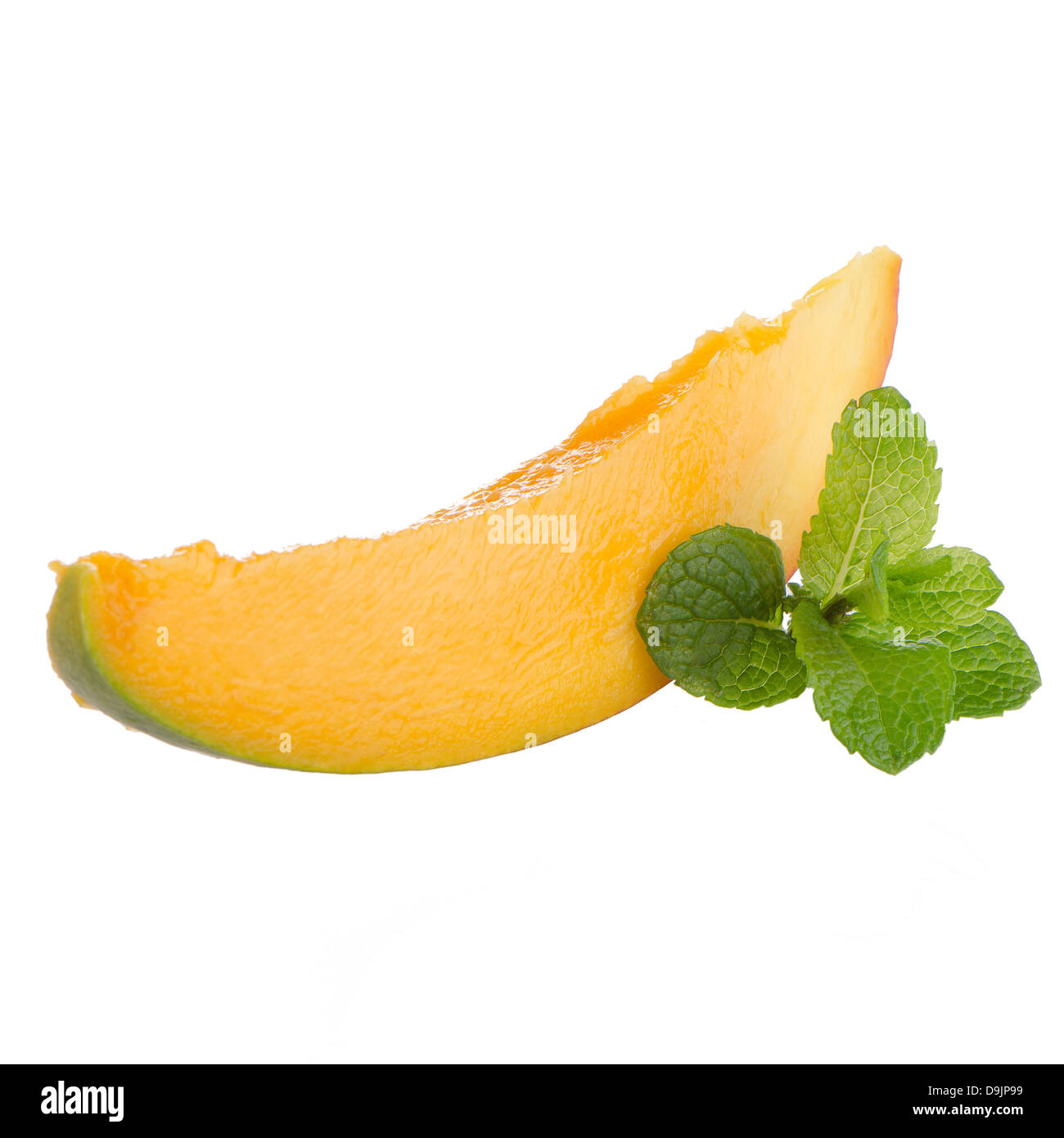 Mango fruit slice on white reflective background Stock Photo - Alamy