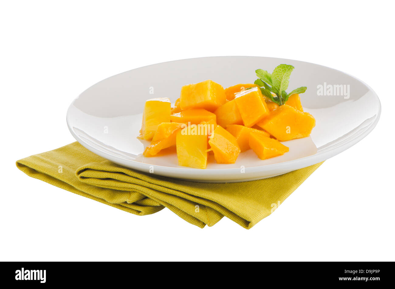 Mango fruit on white plate on white background Stock Photo - Alamy