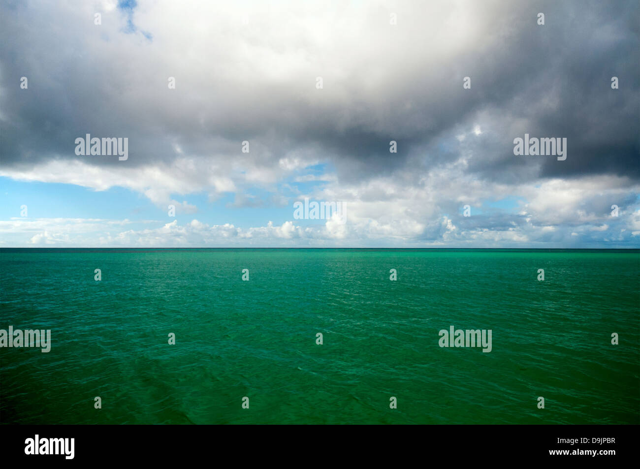 Storm clouds gathering over the indian ocean, Seychelles Stock Photo ...