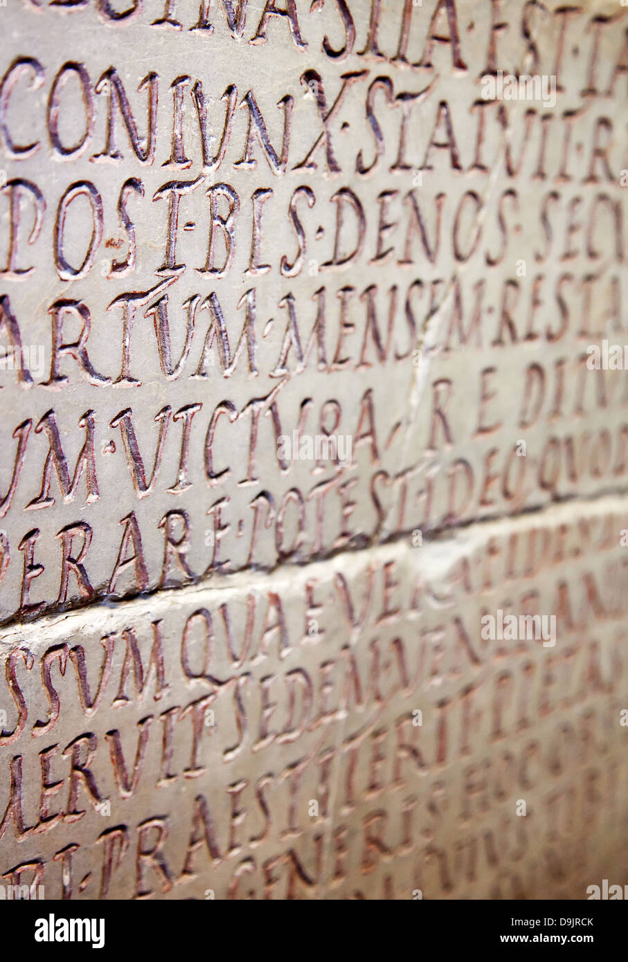 Pre-christian latin writing carved on the tombstone Stock Photo - Alamy