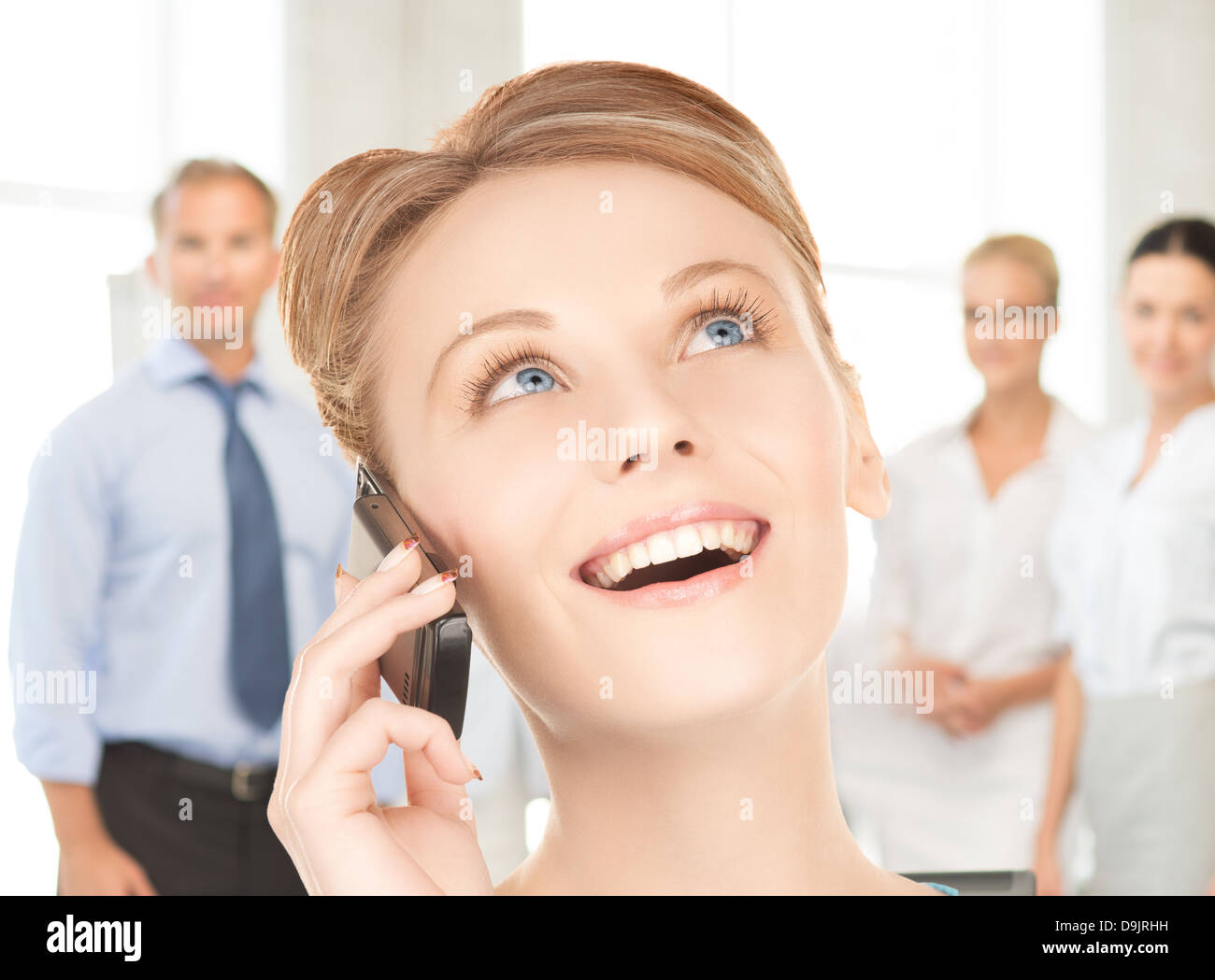 businesswoman with cell phone calling Stock Photo - Alamy