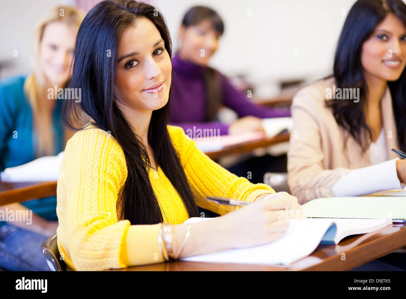 group of young female college students in classroom Stock Photo - Alamy