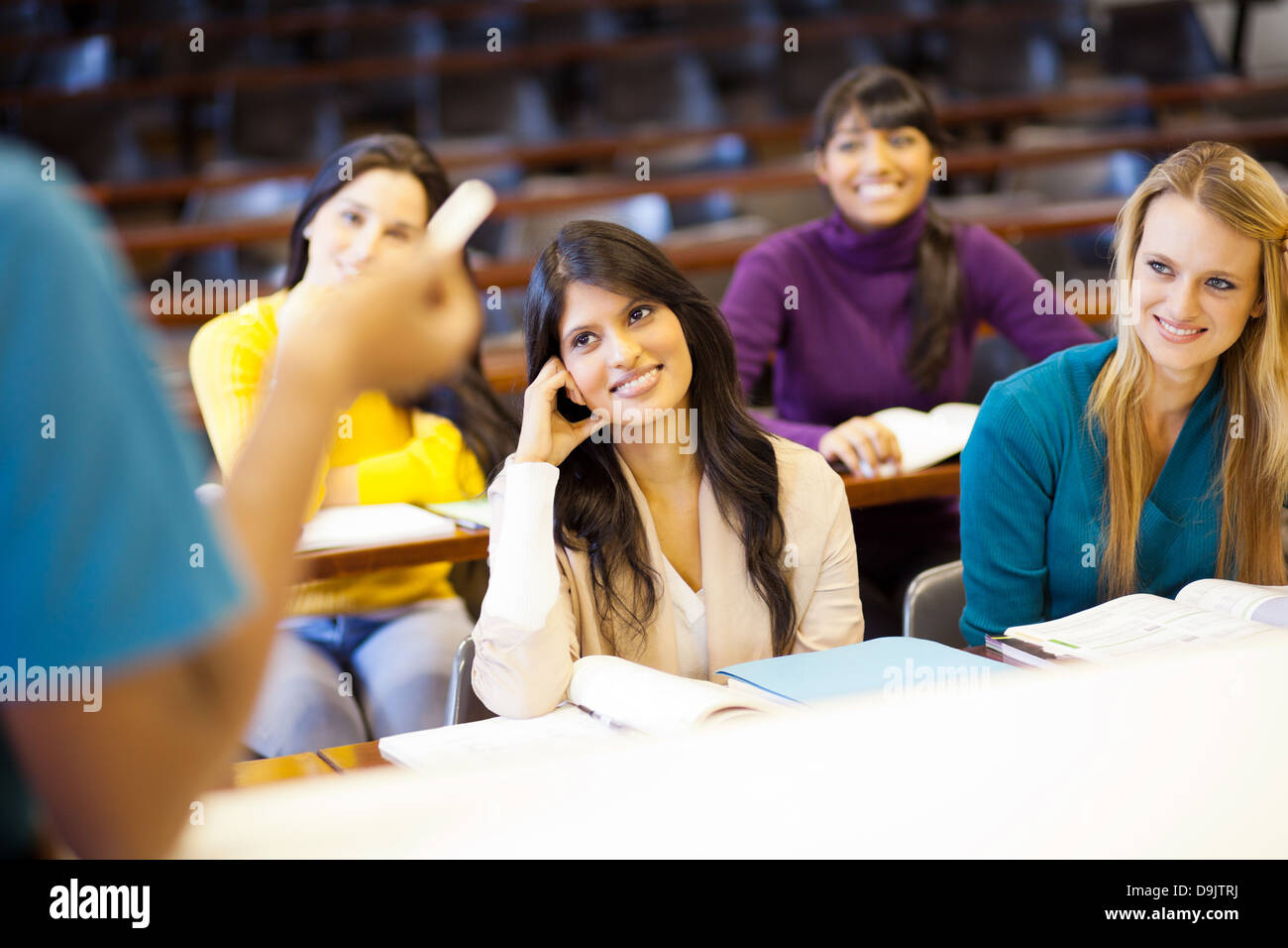 college professor lecturing group of students in classroom Stock Photo ...